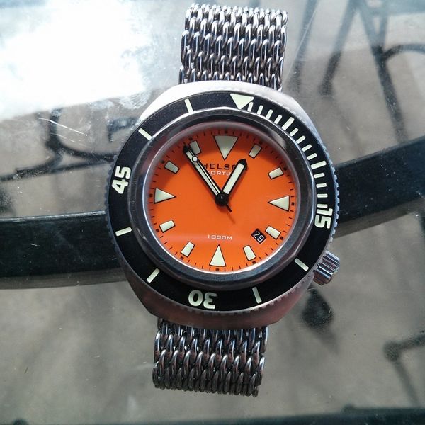 SOLD: Helson Tortuga Orange Dial Full Set. NM | WatchCharts Marketplace