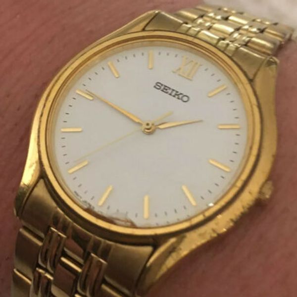 RARE VINTAGE Seiko MENS GOLD WATCH V701-7A20 | WatchCharts Marketplace