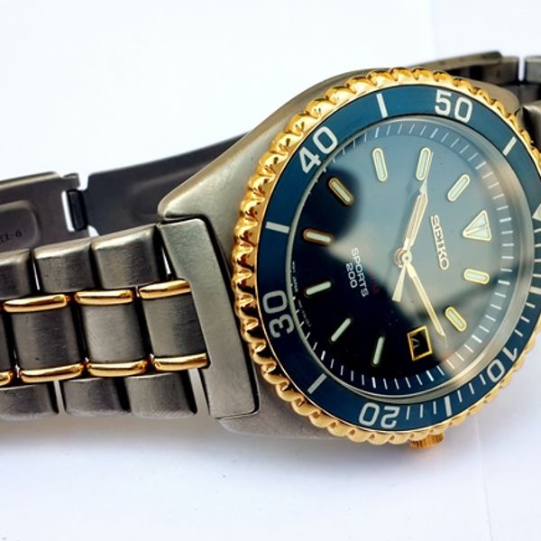 SOLD Seiko 7n42 f100 titanium blue dial dive watch 200m | WatchCharts ...