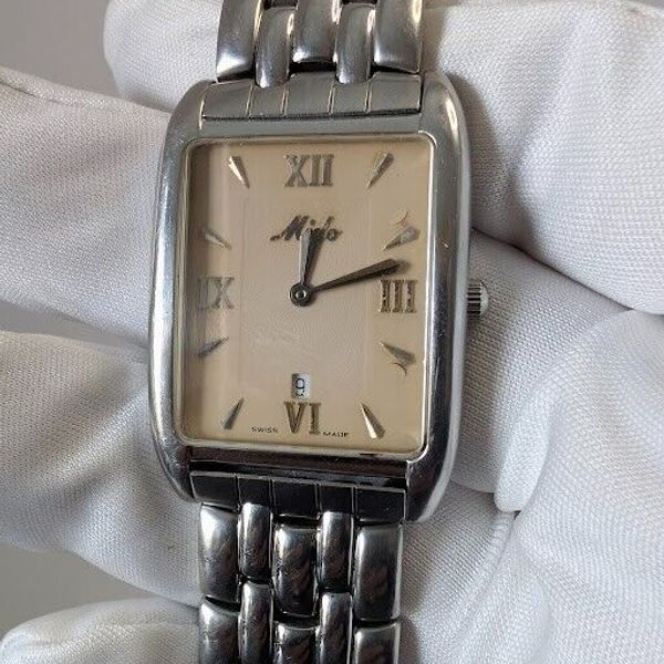 Mido Tank Watch â Vintage Swiss Elegance, Sapphire Crystal & Date ...