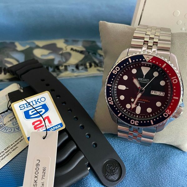 Seiko SKX009J1 JDM with Strapcode Jubilee | WatchCharts