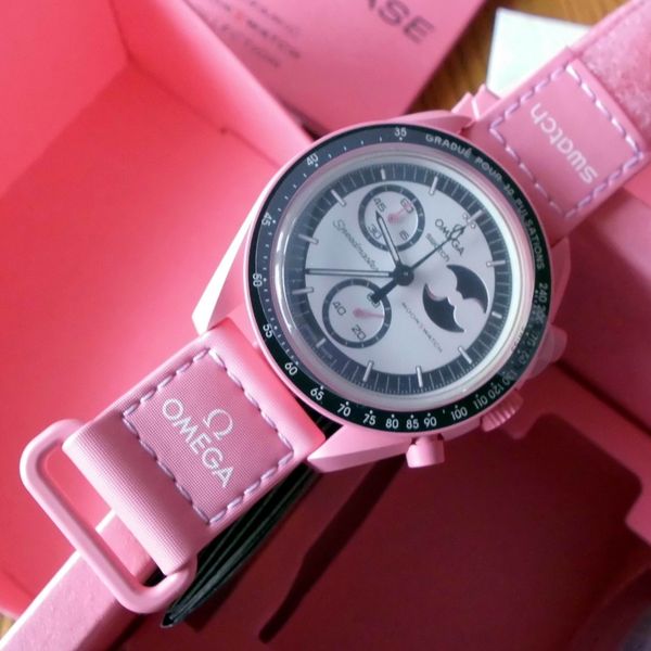 Swatch Omega Pink Unworn Complete UV Lamp Included | WatchCharts ...