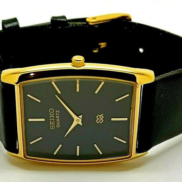 Seiko Quartz Super Slim Men's Gold Plated Analog Rectangle Black Face ...