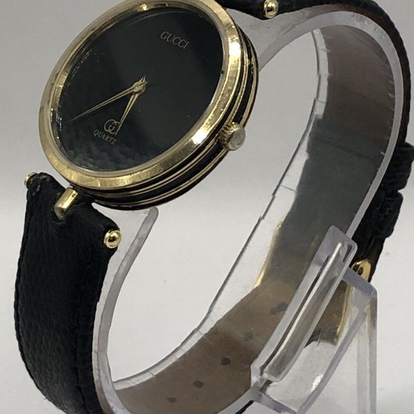 Gucci 2000M Black Dial Gold Men's Quartz Vintage Watch | WatchCharts ...