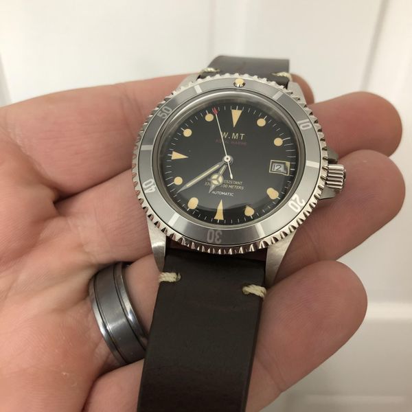 WMT dive watches (Sub homage) and Seiko Sportura | WatchCharts Marketplace