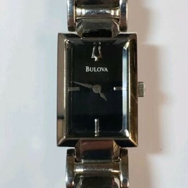 Vintage Bulova Women's Watch with Rectangular Case and Black Face ...