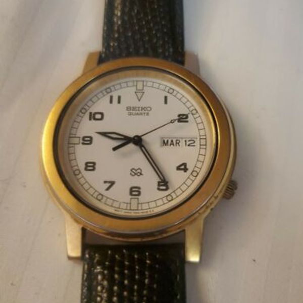 Vintage Seiko SQ 7N43-8A10 Gold Tone Quartz Analog Men's Watch new battery | WatchCharts Marketplace