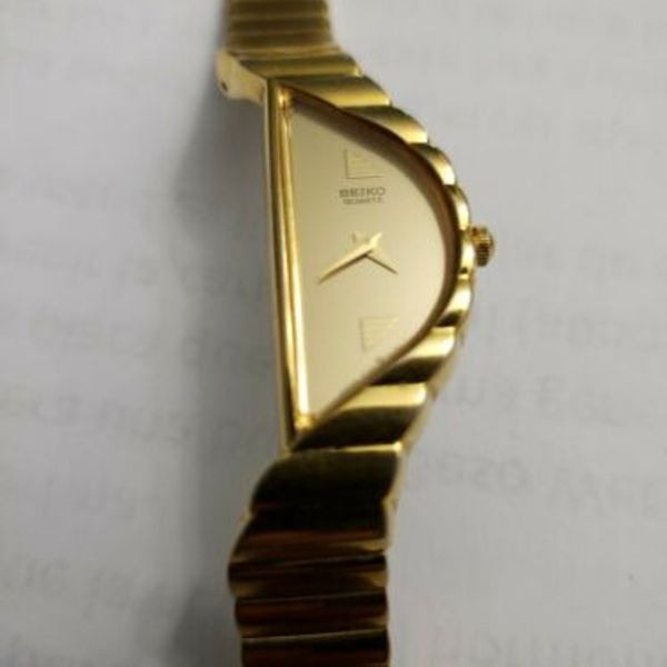Seiko Women's Half Moon Watch | Gold Bracelet & Dial | 1F20-5D59 | WatchCharts Marketplace