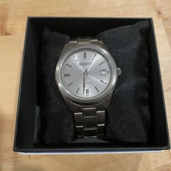 Seiko Titanium Menâ s watch SUR369 | WatchCharts Marketplace