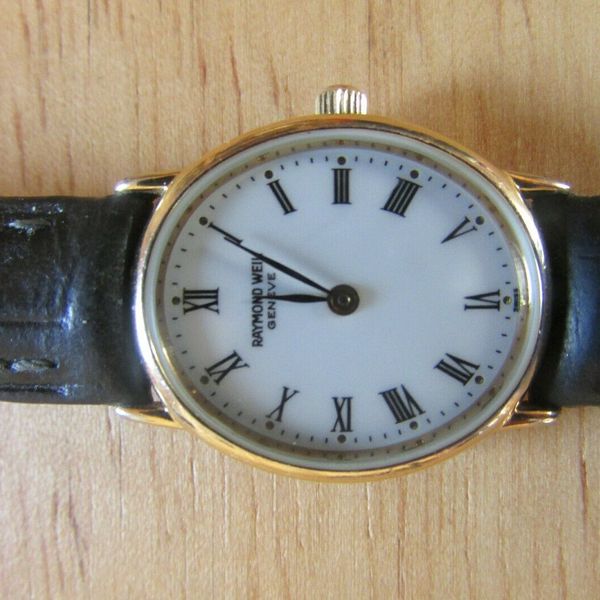 RAYMOND WEIL 18K GOLD PLATED OVAL FACE WATCH 5824 | WatchCharts