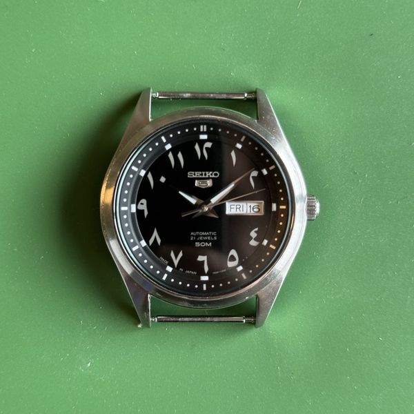 Seiko SNKP21J1 Arabic Dial Automatic Watch | WatchCharts Marketplace