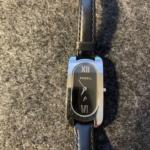 Fossil ladies watch with black narrow rectangular dial and black ...