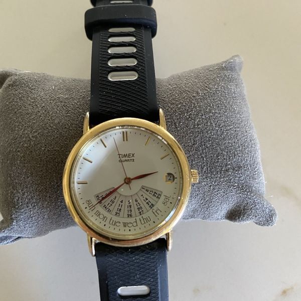 Timex 395 LA quartz watch with a black rubber strap and a gold-tone ...