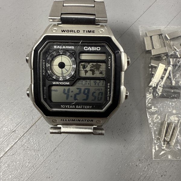 Casio Men's AE1200WH Stainless Analog Digital Multi-Function Watch ...