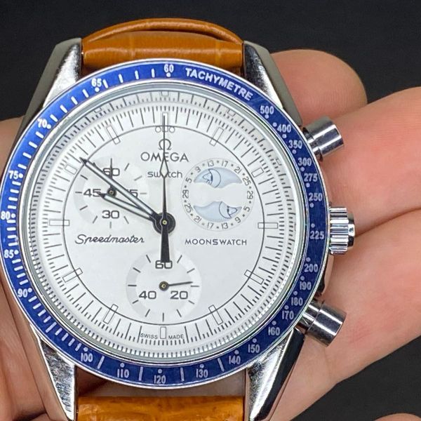 Omega x Swatch Moonswatch Metal Case Mod - Snoopy | WatchCharts Marketplace