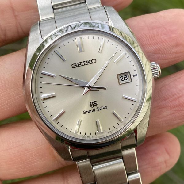 Grand Seiko. Champagne Dial. 9F62 HAQ Movement. | WatchCharts