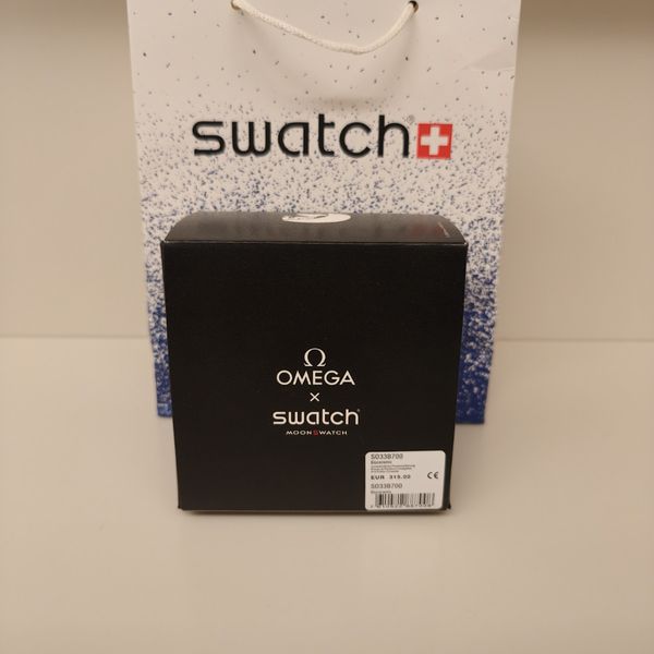 OMEGA X Swatch SO33B700 Moonswatch Snoopy | WatchCharts Marketplace