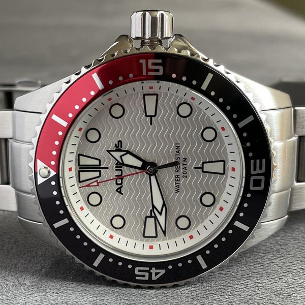[$45 USD] Aquinus Quartz Diver: White Wave-pattern dial | WatchCharts ...