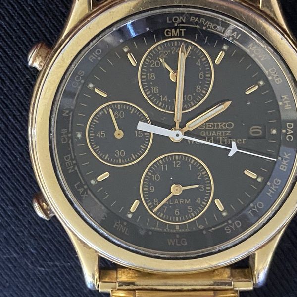 Seiko World Time Watch Men 38mm Black Dial Gold Tone | WatchCharts ...