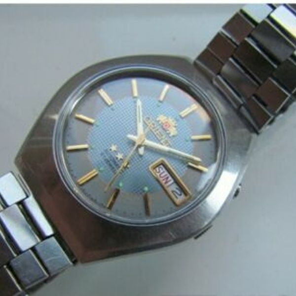 Vintage Orient Japanese Three-Star Wrist Watch on Dial | WatchCharts