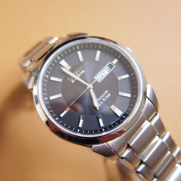 CITIZEN Eco-Drive Full Titanium Men's Solar Watch (Black Dial ...