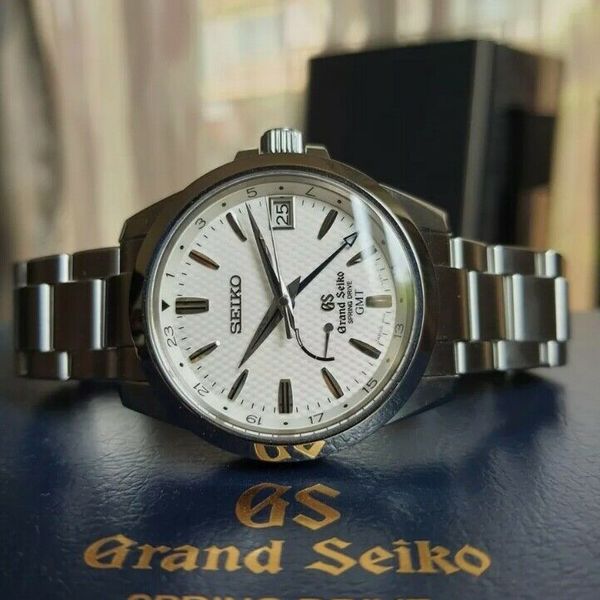 Seiko Grand Seiko Spring Drive GMT sbge 009 double logo | WatchCharts