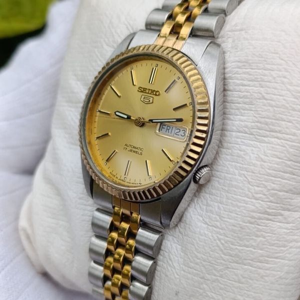 Vintage Seiko 5 Automatic Day/Date 7009-3110 Golden Dial Japan | WatchCharts Marketplace