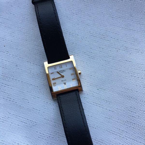 2000s Men's Rotary Elite Quartz Calendar Battery Wristwatch. Gold ...