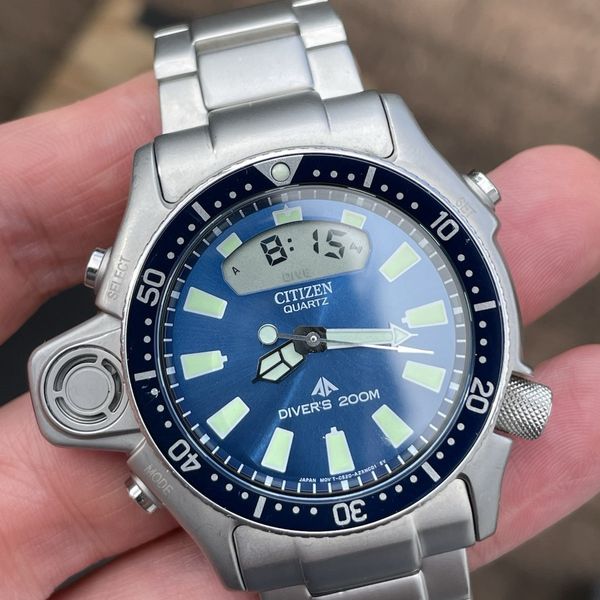 Citizen Promaster Aqualand Sports Quartz Diver's 200M Men's Watch JP2000-67L | WatchCharts ...
