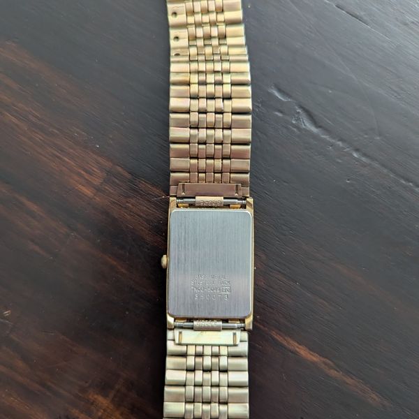 Vintage Seiko 7N00-5049 Diamond Accent Black Gold Quartz Mens Watch | WatchCharts Marketplace