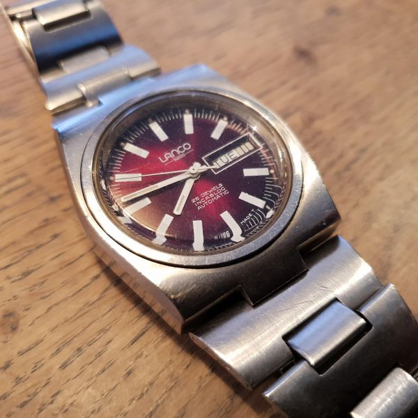 LANCO Swiss made red dial automatic | WatchCharts