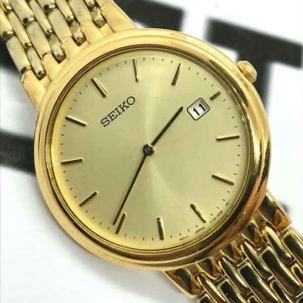 Men’s Vintage Seiko Quartz Gold Dress Watch - V739-0A50 - Boxed | WatchCharts Marketplace