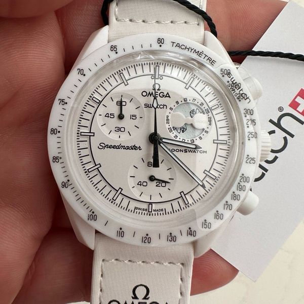 Omega X Swatch - Moonswatch - Mission to the Moonphase - â Snoopyâ FULL ...