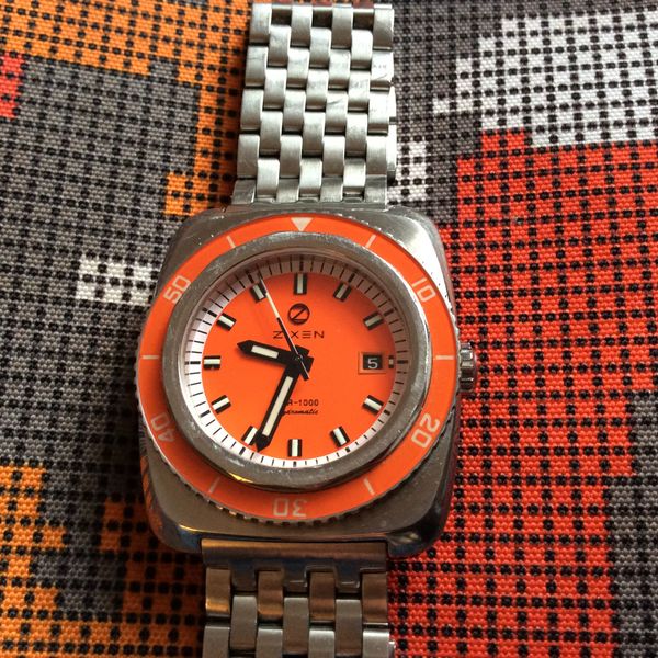 Zixen DSR 1000 Orange Dial Bezel in Canada | WatchCharts Marketplace