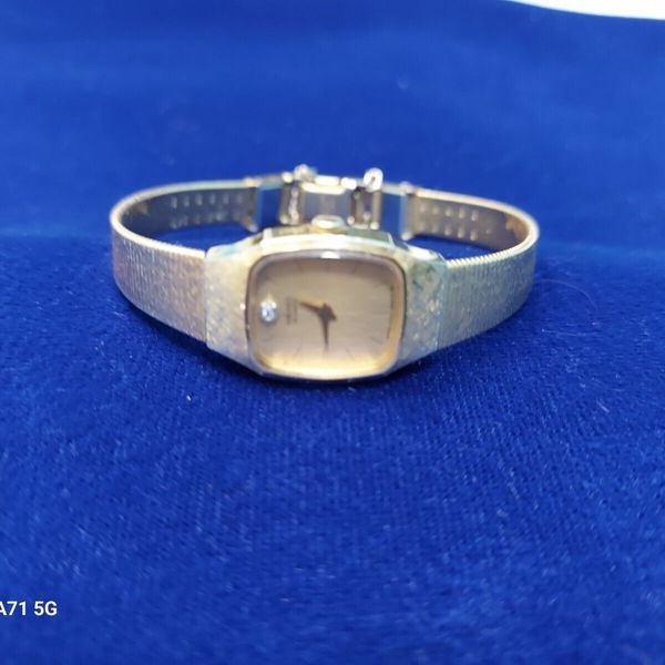 Seiko Quartz Women's Gold Tone Watch, Safety Chain | WatchCharts ...