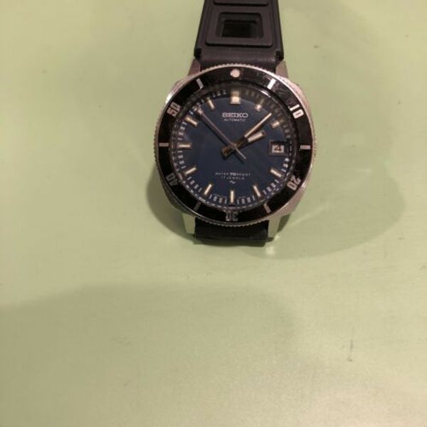Vintage Seiko Automatic 7005-8052 Blue Dial Date Black Rubber Strap Used | WatchCharts Marketplace