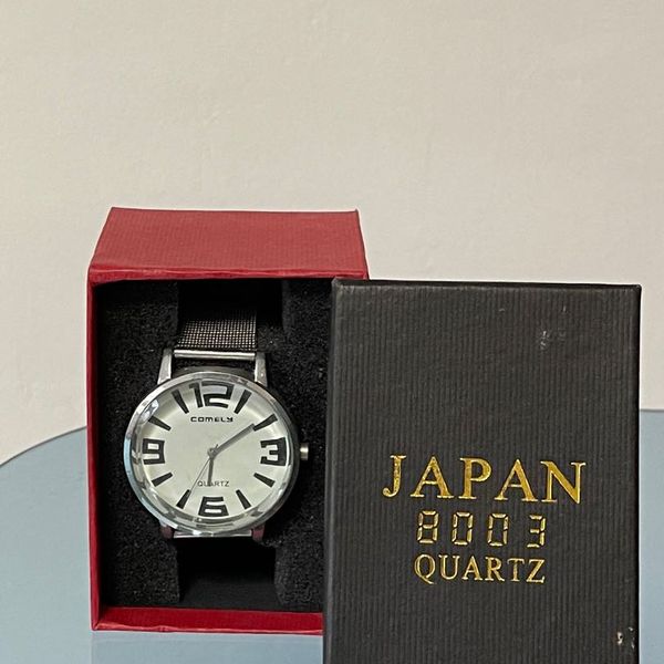 Comely Japan 8003 Quartz watch | WatchCharts