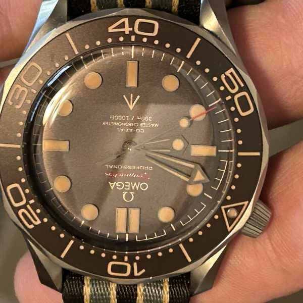 OMEGA Seamaster No Time To Die Both Bracelets Included | WatchCharts Marketplace