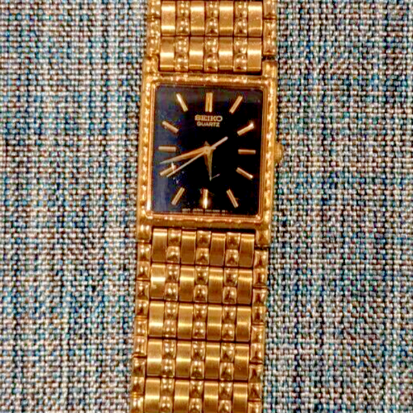 Seiko Tank Watch Men Black Dial Gold Tone Rectangle 7N01-5C39 - READ | WatchCharts Marketplace