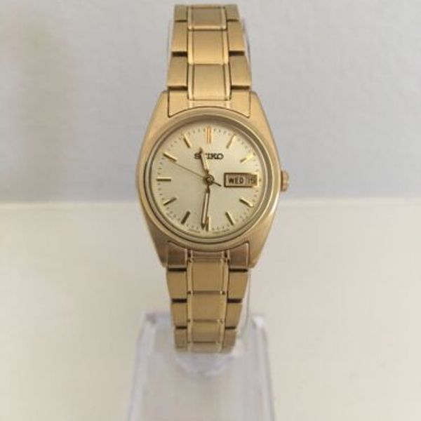 Classic Seiko 7N83-0011 Women’s Gold Tone Quartz 24mm Day & Date | WatchCharts Marketplace