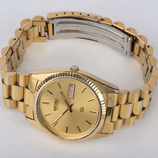 Vintage Seiko SQ Quartz Gold Tone Mens Watch 36" - Running | WatchCharts Marketplace
