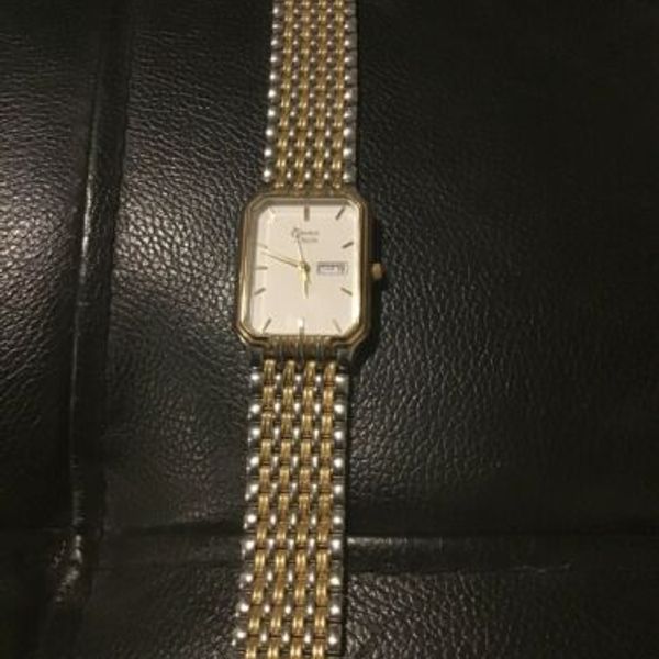 Caravelle by Bulova T6 Two Tone Quartz Analog Ladies Watch | WatchCharts