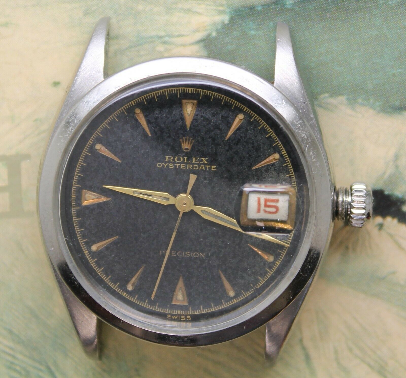 Vintage Rolex OysterDate 6294 Black Gilt Dial 1953 | WatchCharts