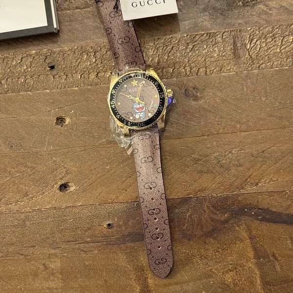 Gucci Dive Doraemon Quartz Brown Dial Brown Leather Strap Watch ...