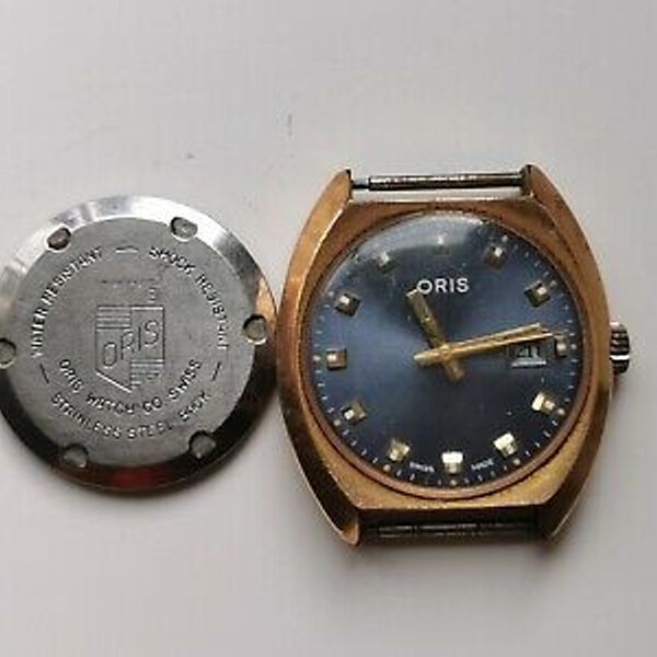 MENS VINTAGE ORIS Cal. 715 GOLD PLATED SWISS MADE MANUAL WIND CALENDAR WATCH | WatchCharts ...