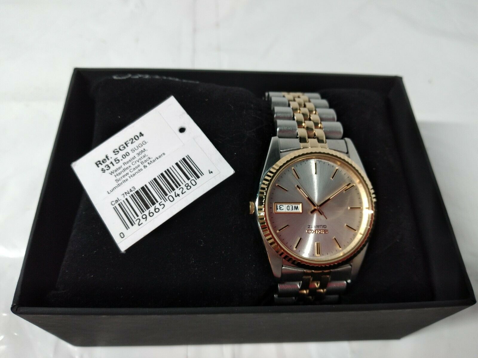 Seiko SGF204 Men's Stainless Steel Water Resistant Day Date Quartz Watch | WatchCharts