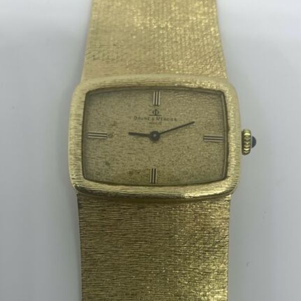 Baume & Mercier Classic 14 karat yellow gold. Manual wind | WatchCharts