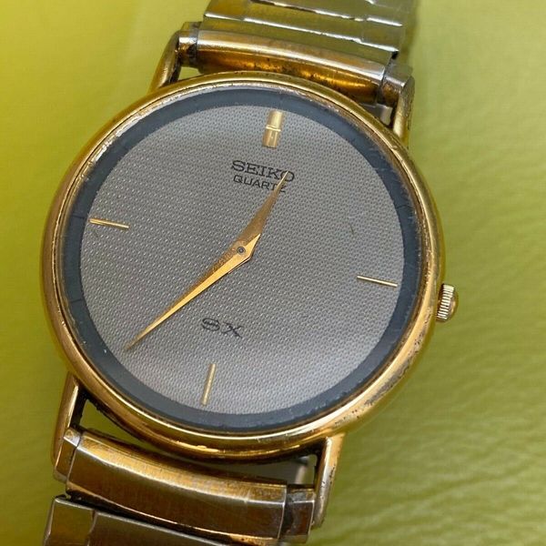 VINTAGE MENS QUARTZ SEIKO SX WRISTWATCH 5Y30-7000 GRAY DIAL GOLD TONE BEZEL | WatchCharts ...