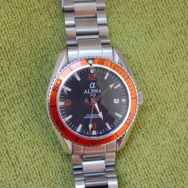 FS: Alpha Planet Ocean - $54 Shipped CONUS | WatchCharts Marketplace