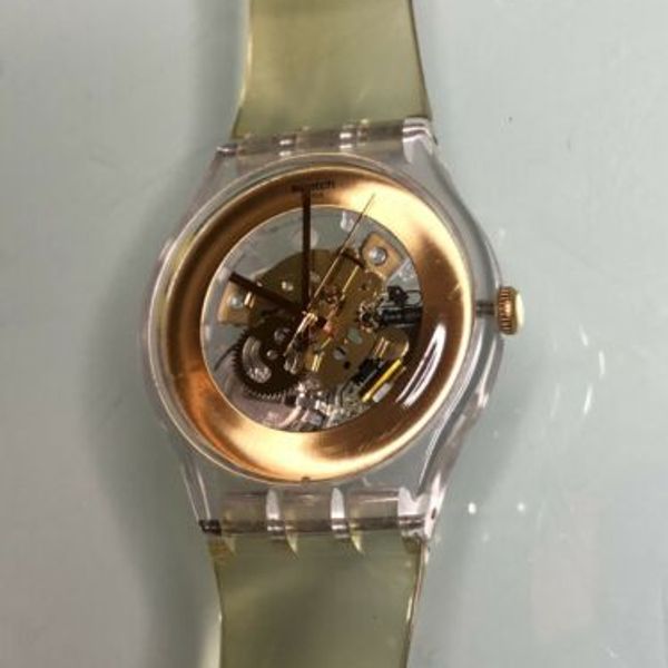 Swatch Watch Clear Strap With Gold Mechanism | WatchCharts